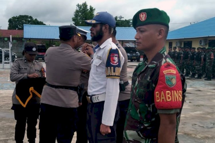 Babinsa Koramil Kepi Ikut Serta Apel Pasukan Operasi Keselamatan Cartenz 2023 - RMOLPAPUA.ID